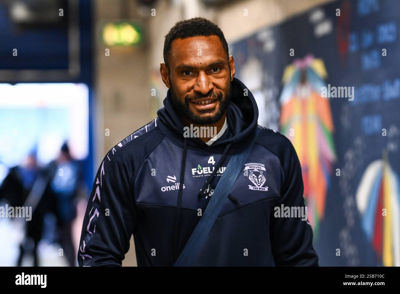 Rodrick Tai of Warrington Wolves arrives ahead of Toby King's ...