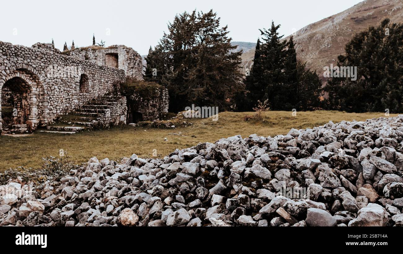 Ancient stone ruins with an arched doorway and crumbling walls ...