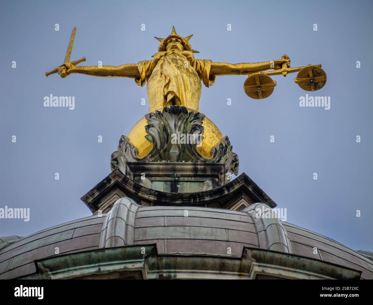 Scales of Justice atop the Old Bailey, London, UK. Symbolizing fairness ...
