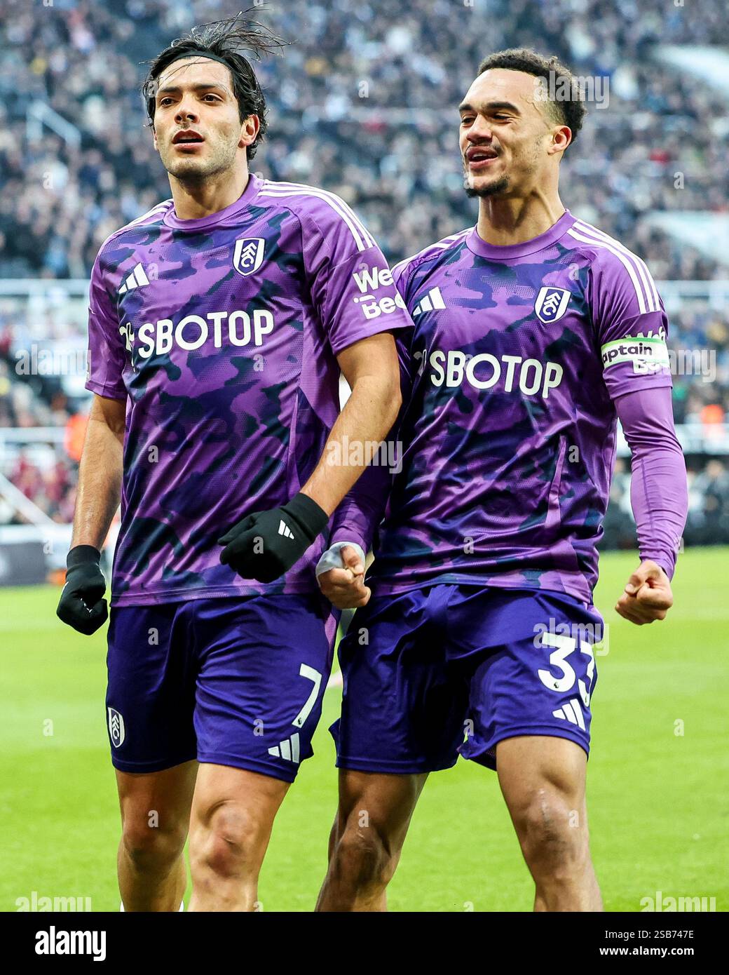 Raul Jimenez of Fulham celebrates his goal with Antonee Robinson to ...