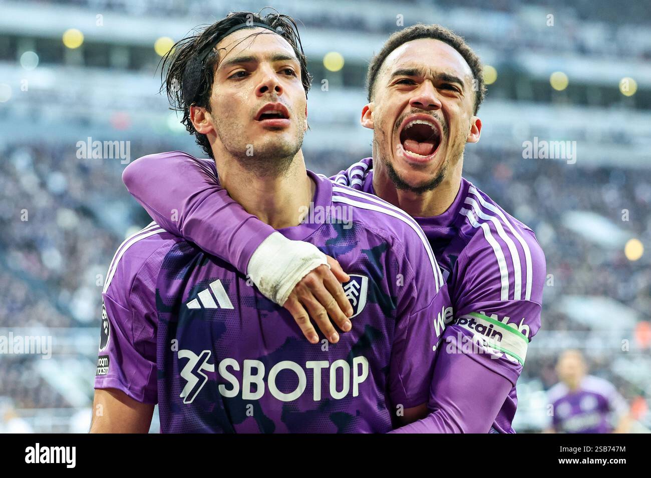 Raul Jimenez of Fulham celebrates his goal with Antonee Robinson to ...