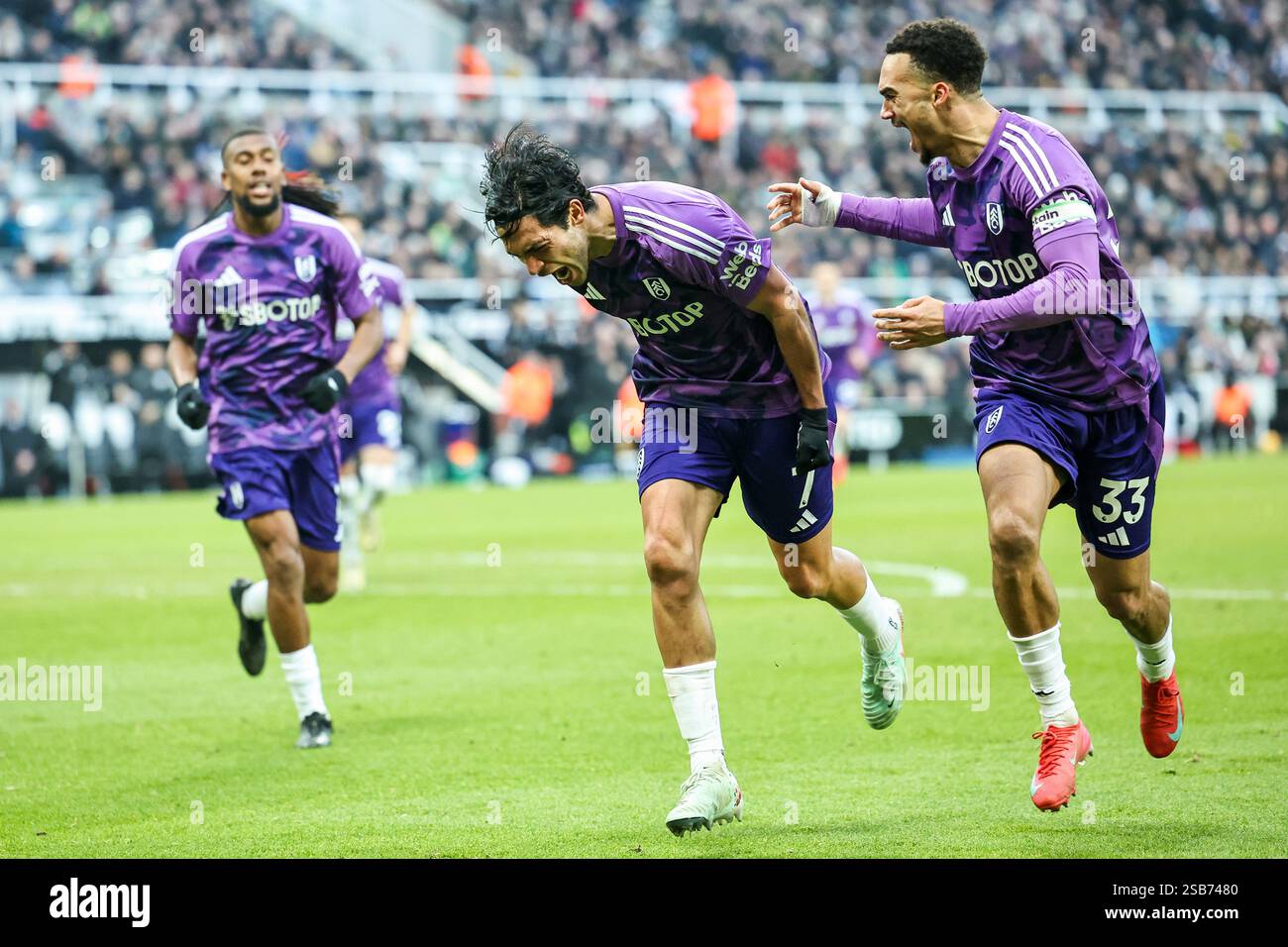 Raul Jimenez of Fulham celebrates his goal with Antonee Robinson to ...