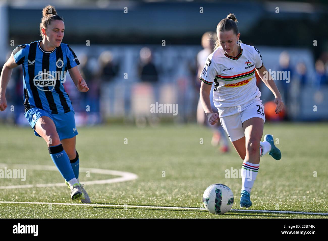 Aalter, Belgium. 01st Feb, 2025. Chloe Vande Velde (8) of Club YLA pictured defending on Flo ...