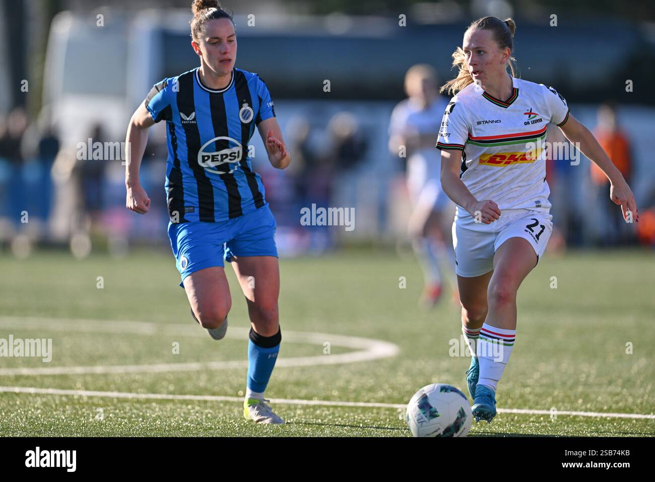 Aalter, Belgium. 01st Feb, 2025. Chloe Vande Velde (8) of Club YLA pictured defending on Flo ...