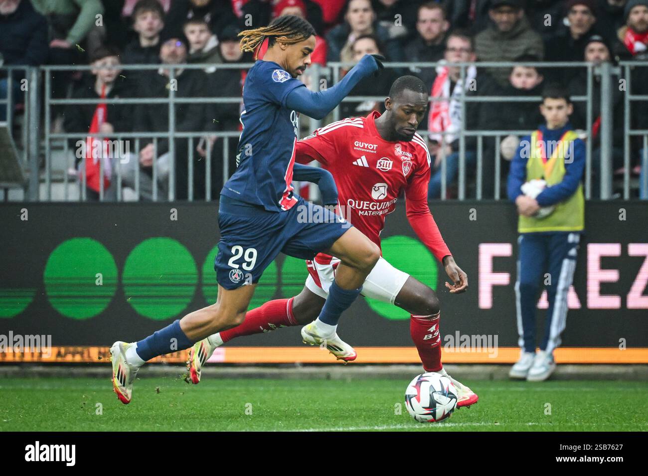 Bradley BARCOLA of PSG and Abdallah SIMA of Brest during the French ...