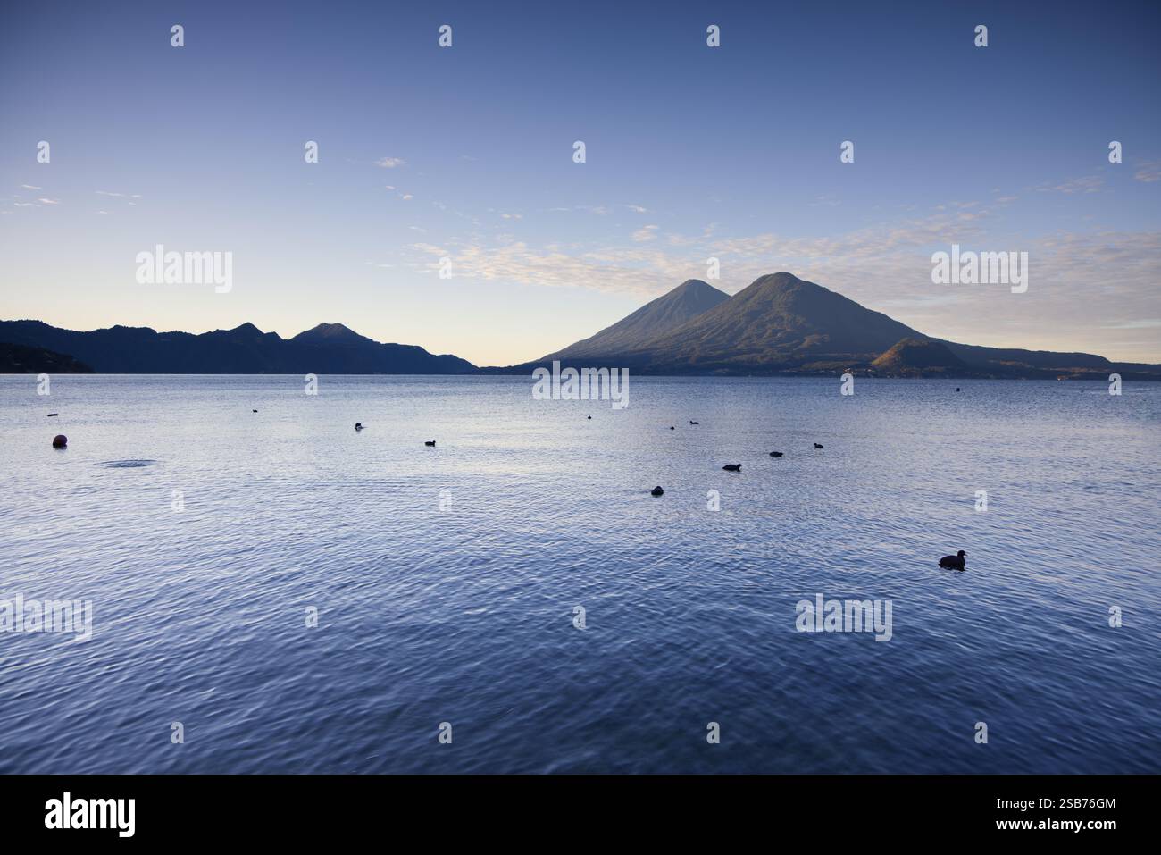 Lake Atitlan with its Volcanoes in Guatemala Stock Photo - Alamy