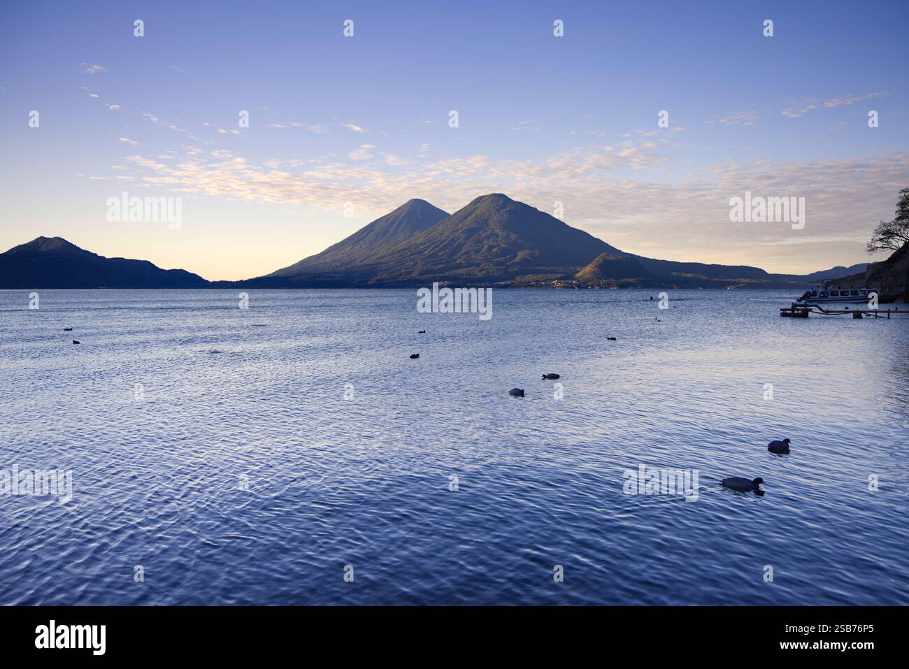 Lake Atitlan with its Volcanoes in Guatemala Stock Photo - Alamy