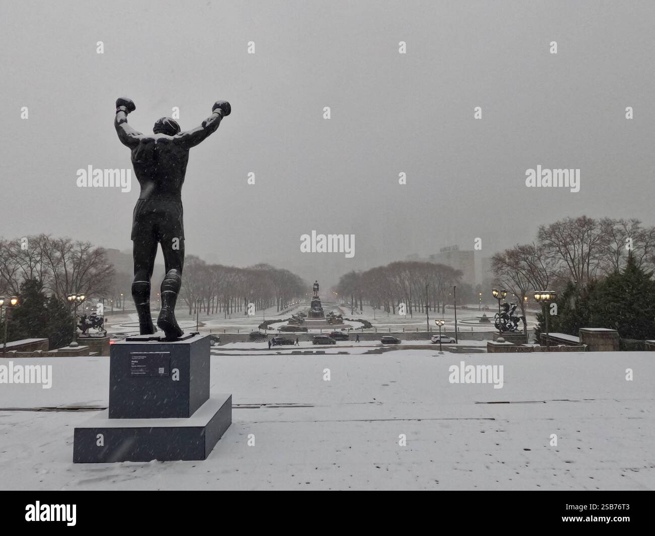 Snow coats the statue of Rocky Balboa at the top of the famous ...