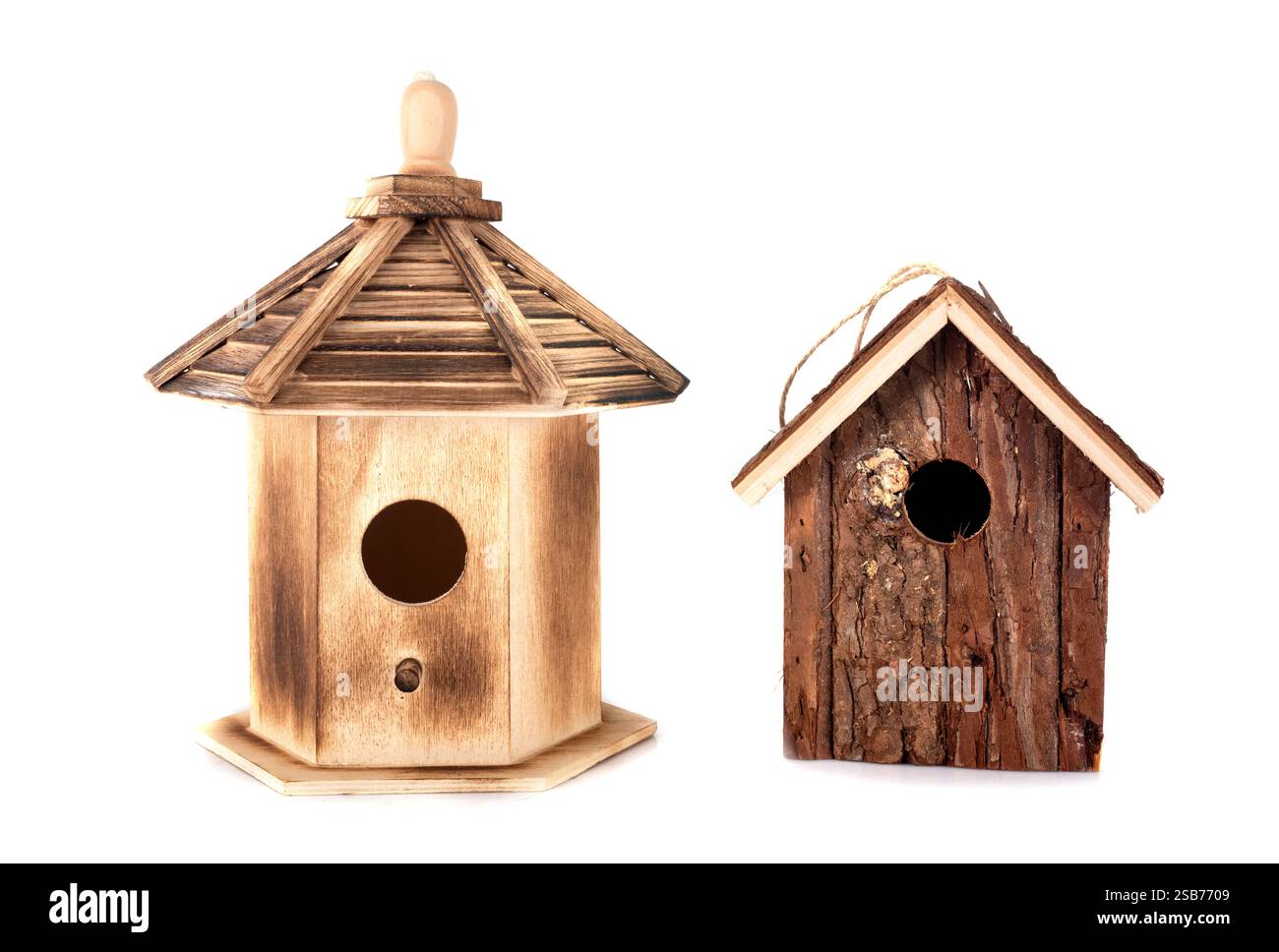 bird nest houses in front of white background Stock Photo - Alamy