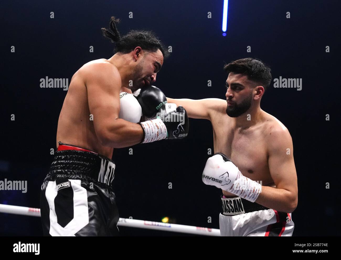 Hassan Azim (right) and Jensen Irving in the middle weight bout at the ...
