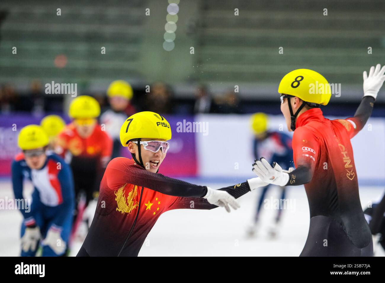 (L to R) Guixu Song and Tianyi Zhang (CHN) celebrate their victory during the Short Track Speed ...