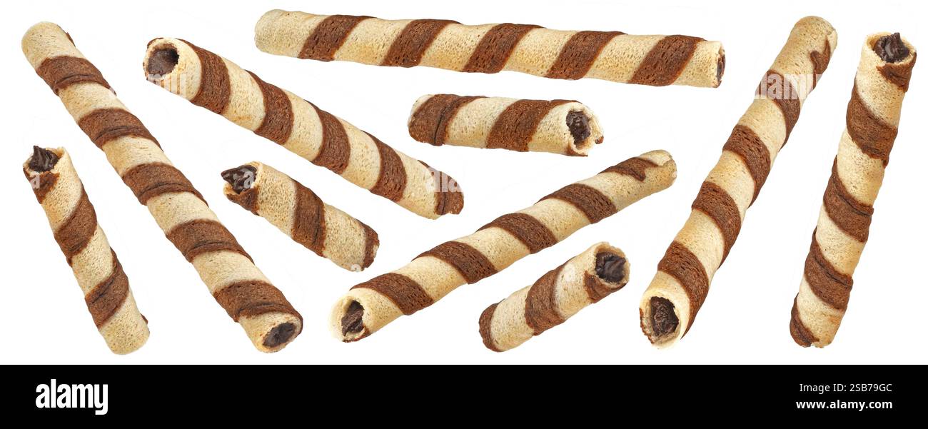 Waffle rolls, striped chocolate and vanilla wafer sticks isolated on ...