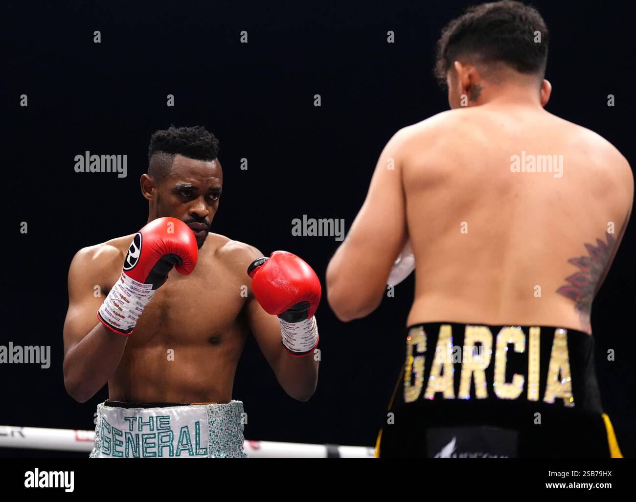 Emmany Kalombo (left) and Sergio Garcia Herrera in the super welter ...