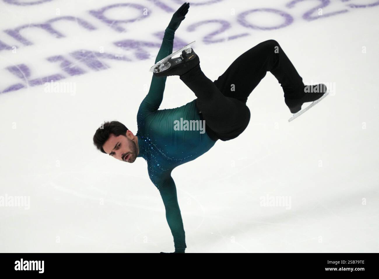 Kevin Aymoz of France performs during the men's free skating program at ...