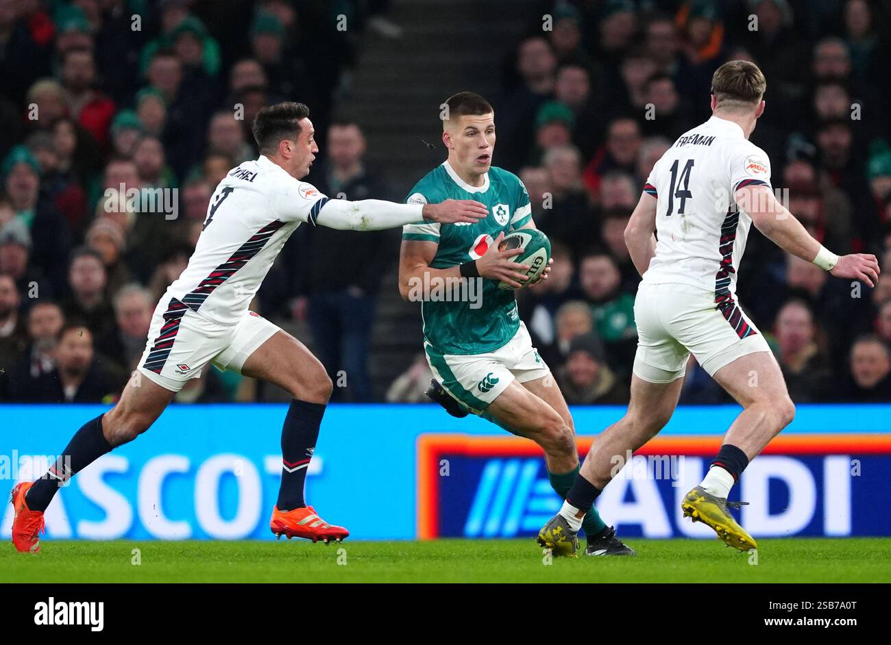England's Alex Mitchell reaches for Ireland's Sam Prendergast during ...