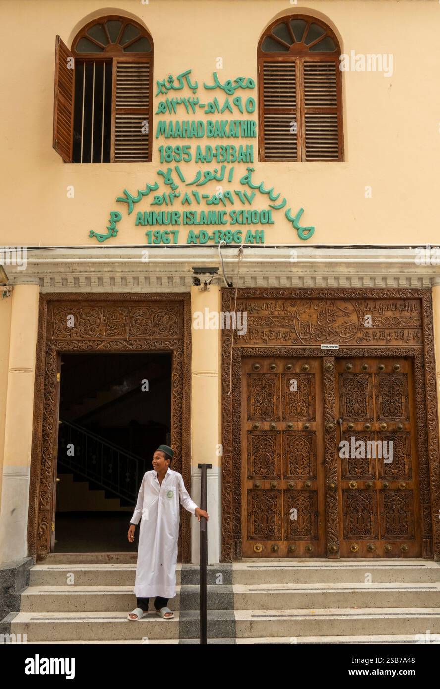 Africa Tanzania, Zanzibar, Stonetown, old town, Moslem boy outside ...