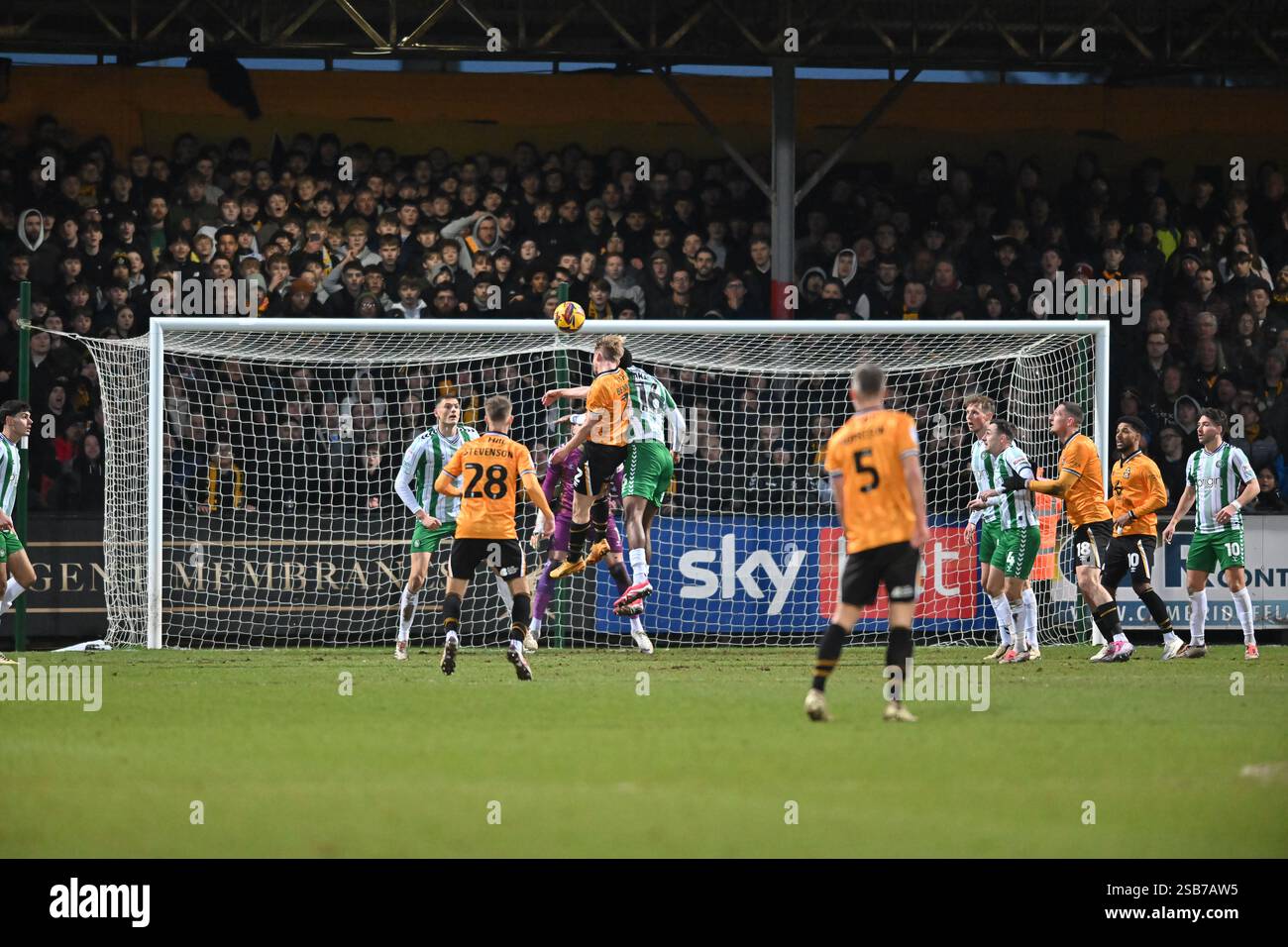 Cambridge, UK. 1st Feb 2025. Liam Bennet (2 Cambridge United) heads ...
