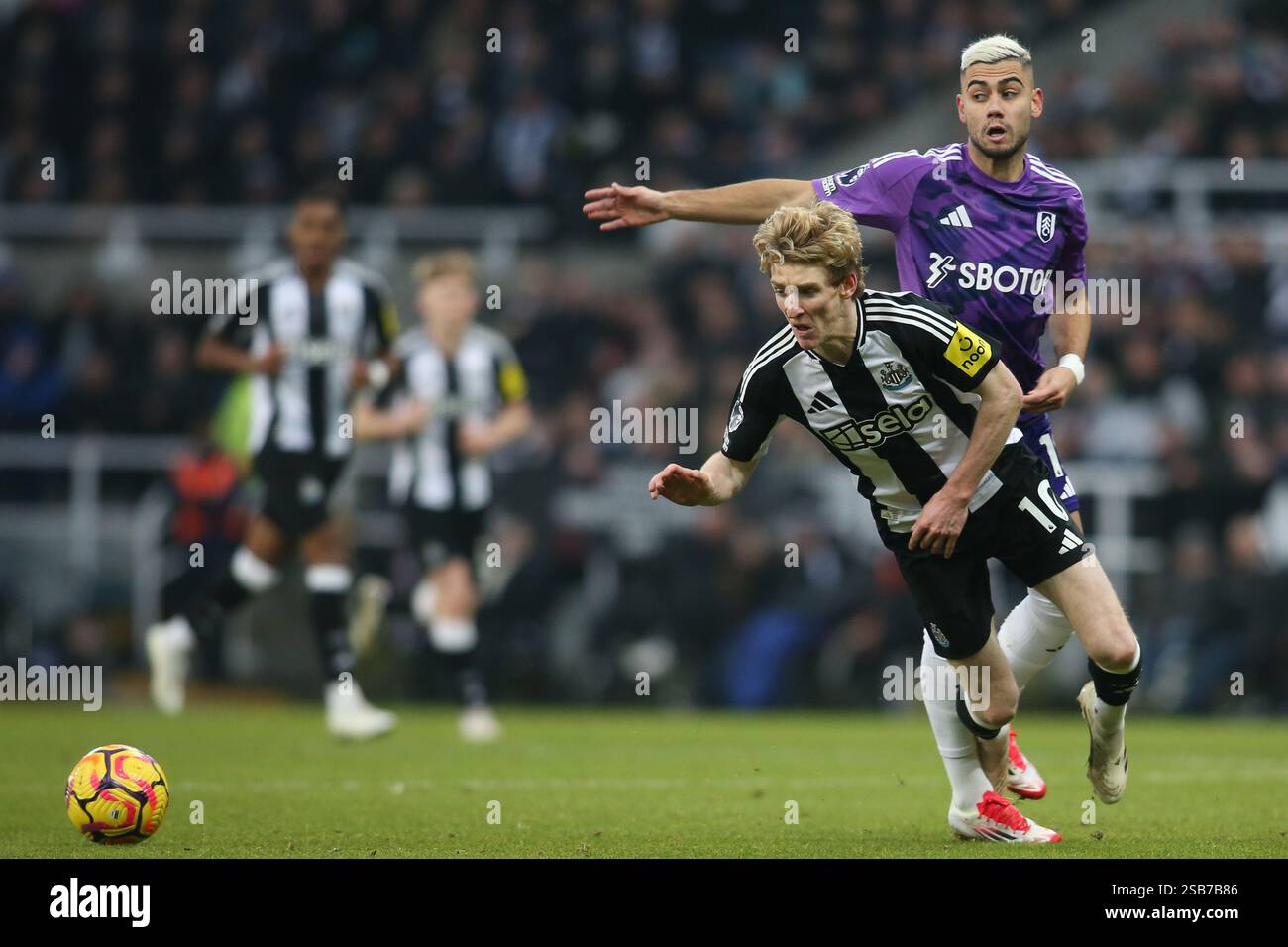 Fulham's Andreas Pereira fouls Newcastle United's Anthony Gordon during ...