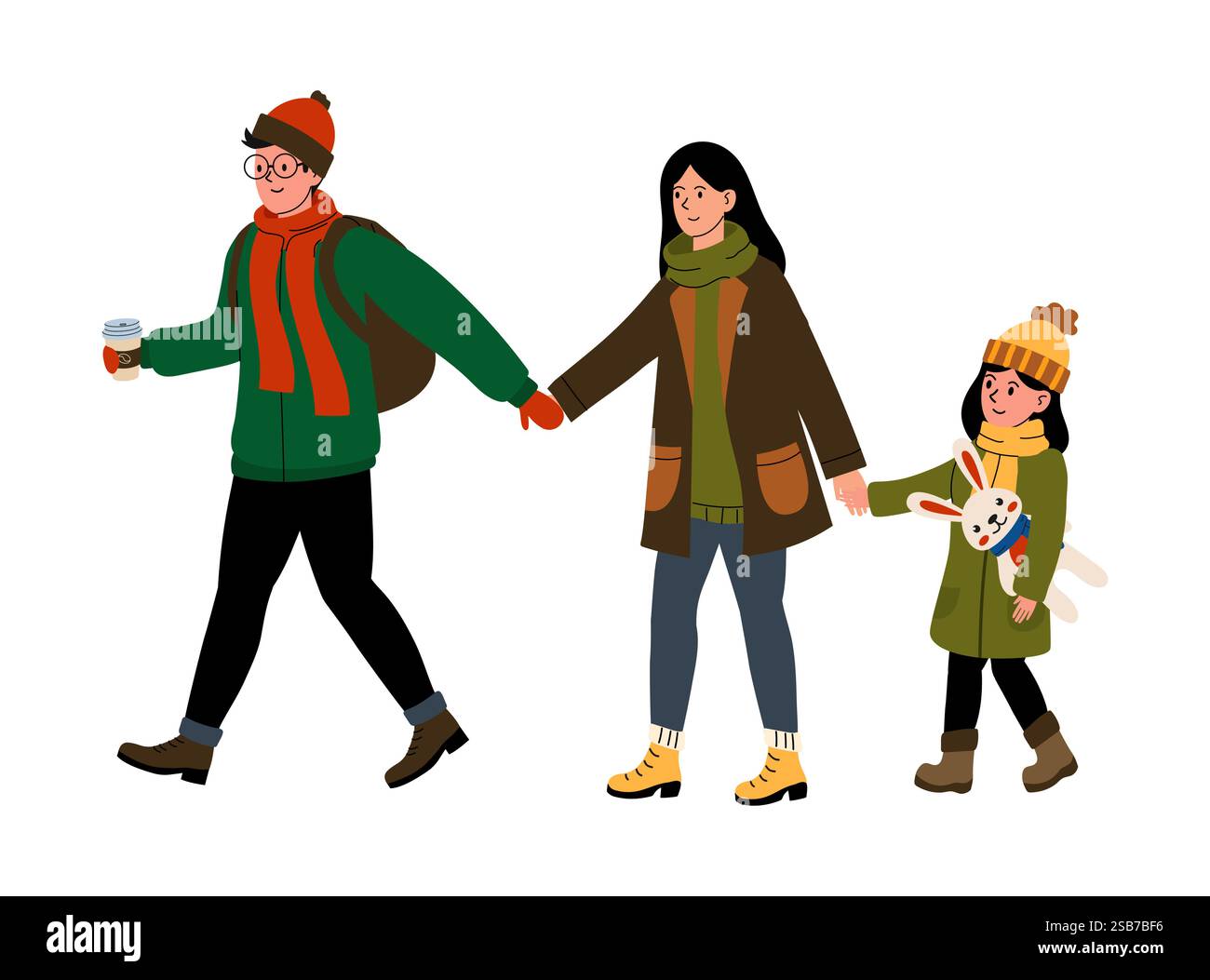 A cheerful family walks together in winter attire, enjoying the cold ...