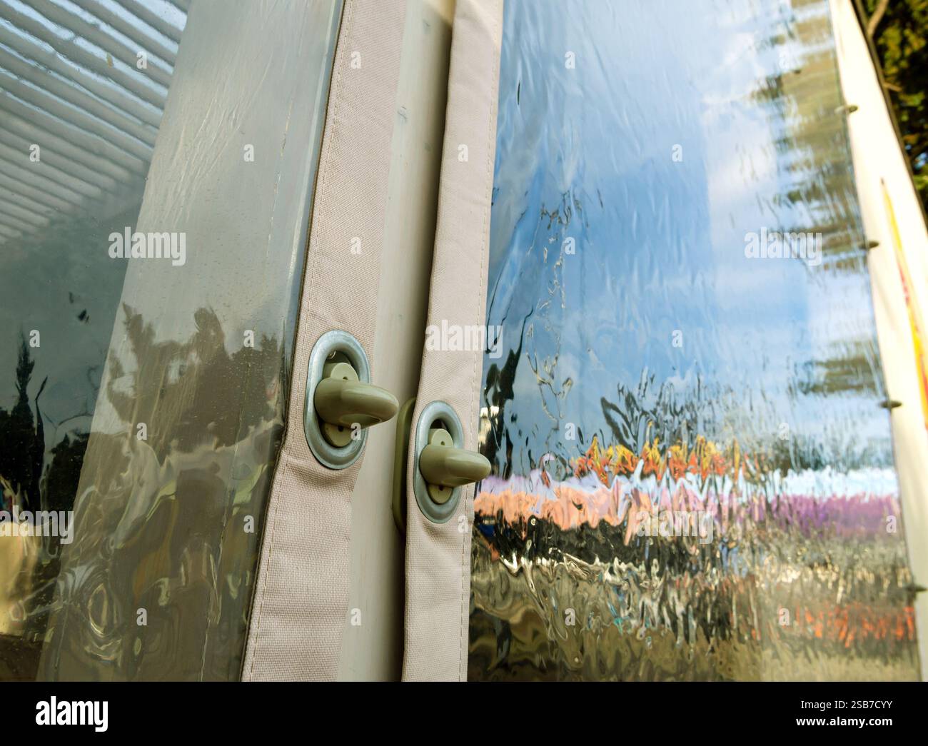 Fastening PVC roller windows in the close position Stock Photo - Alamy