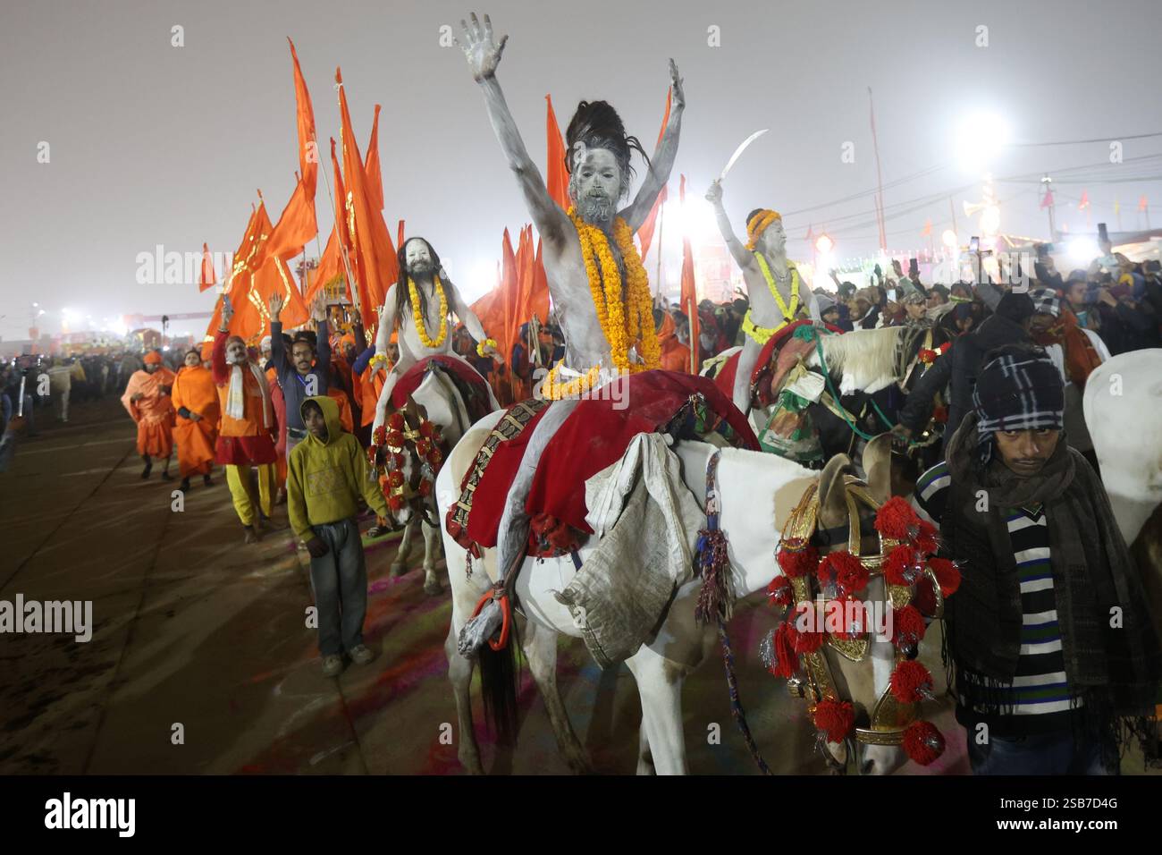 Holymen and others take holy dip on the occasion of Makar Sankranti ...
