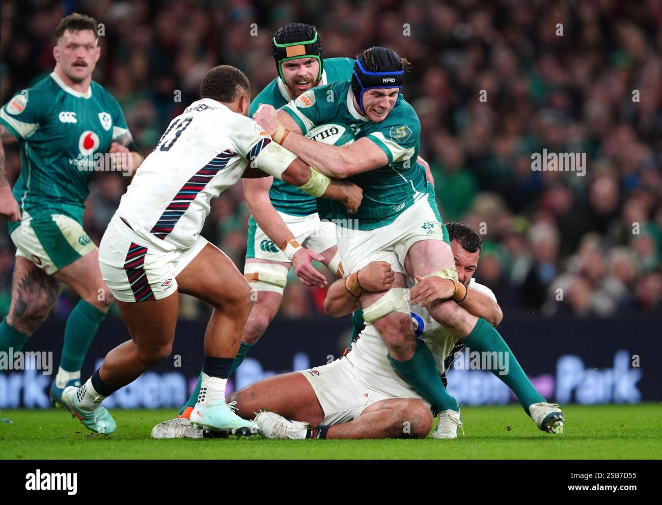 Ireland's Ryan Baird tackled by England's Ollie Lawrence and Ellis ...