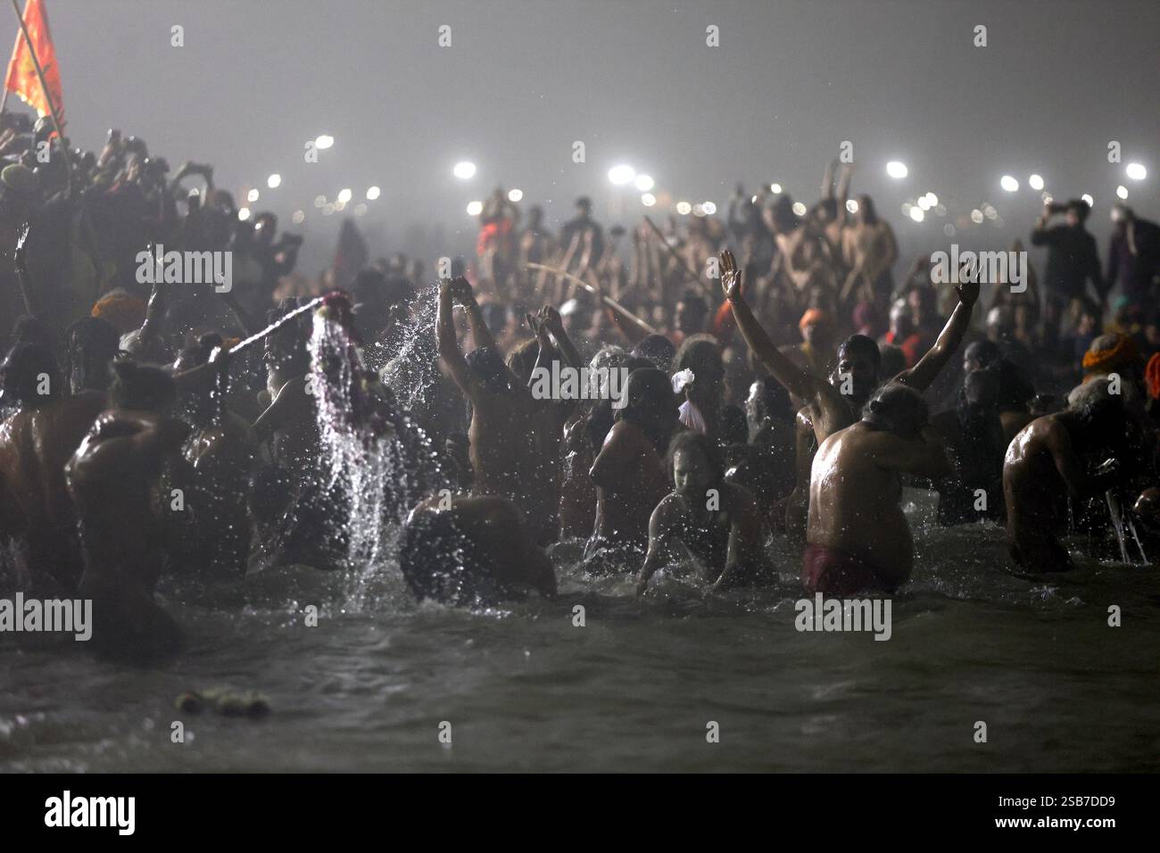 Holymen and others take holy dip on the occasion of Makar Sankranti ...