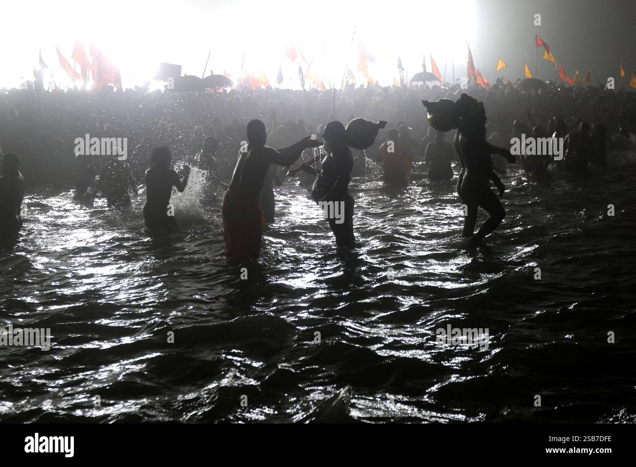 Holymen and others take holy dip on the occasion of Makar Sankranti ...