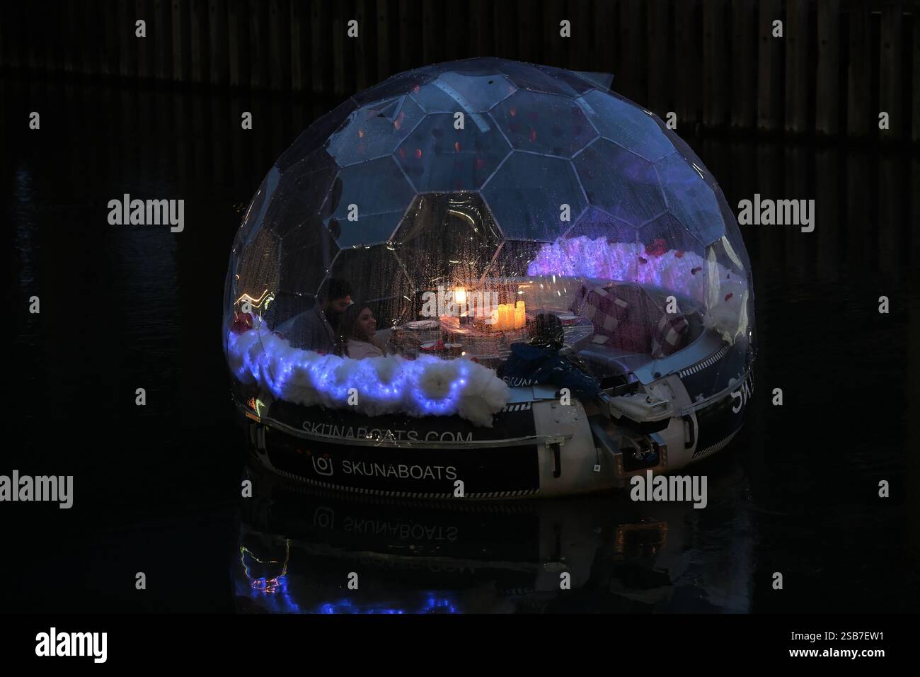 Floating Igloo Boats in West India Quay docklands in Canary Wharf Stock ...