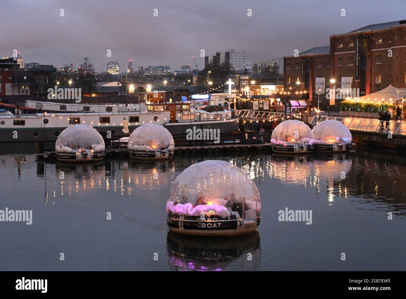 Floating Igloo Boats in West India Quay docklands in Canary Wharf Stock ...