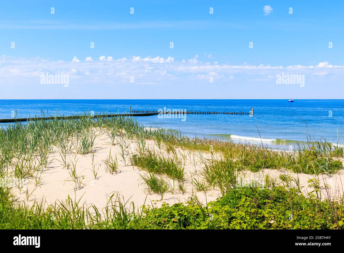 Beautiful white sand beach and blue sea in Darlowko village, Baltic Sea ...