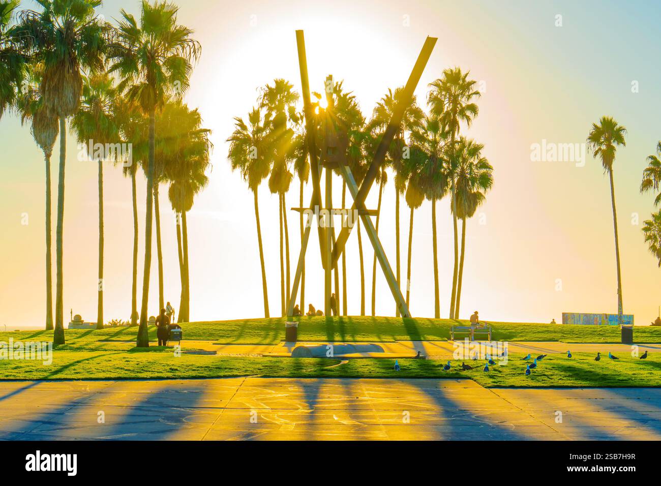 Los Angeles, California - December 18, 2024: Golden sunlight casts long ...