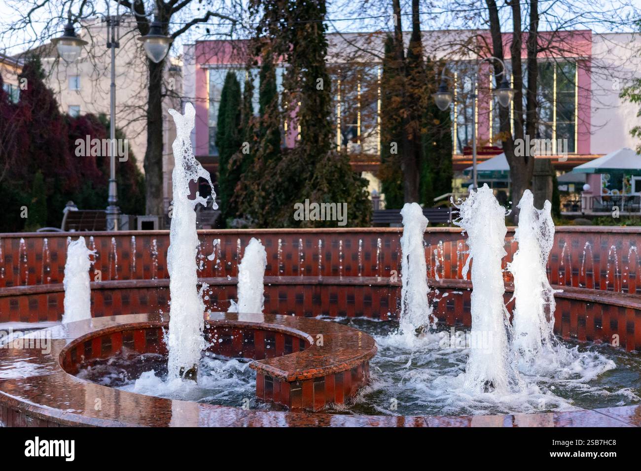 The vibrant fountain showcases multiple streams of water shooting ...