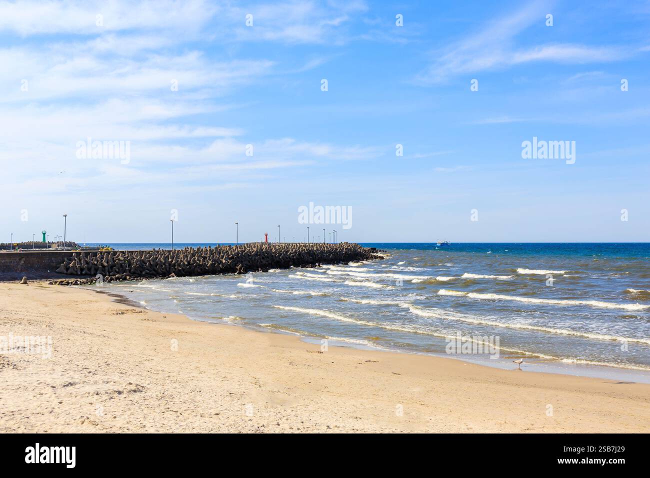 Beautiful white sand beach and blue sea in Kolobrzeg, Baltic Sea coast ...
