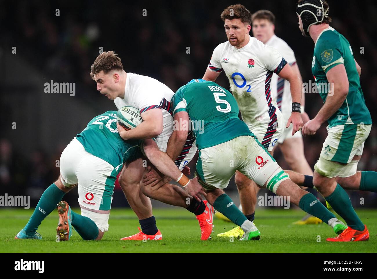 England's Theo Dan tackled by Ireland's Jack Conan and Tadhg Beirne ...