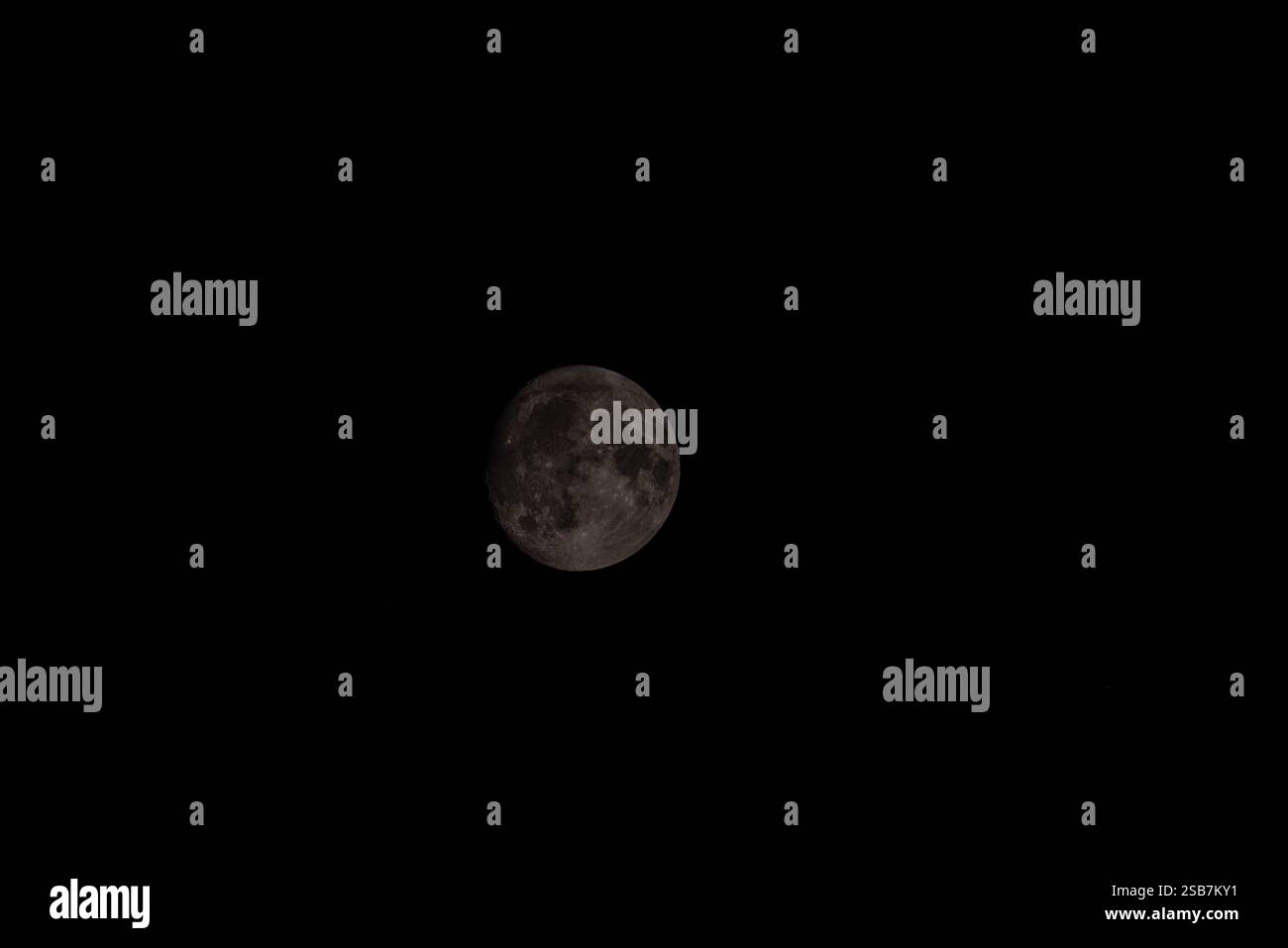 Enigmatic Moon: Haunting Subexposed Night Sky.A subexposed shot ...