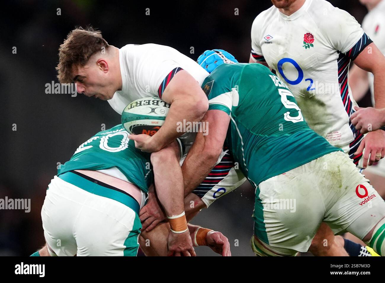 England's Theo Dan tackled by Ireland's Jack Conan and Tadhg Beirne ...