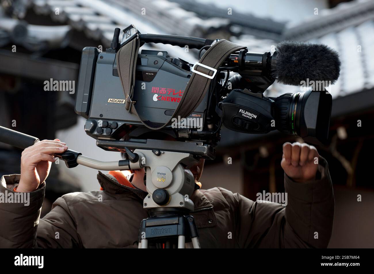 Kansai Television cameraman documenting a ceremonial event in Kyoto ...