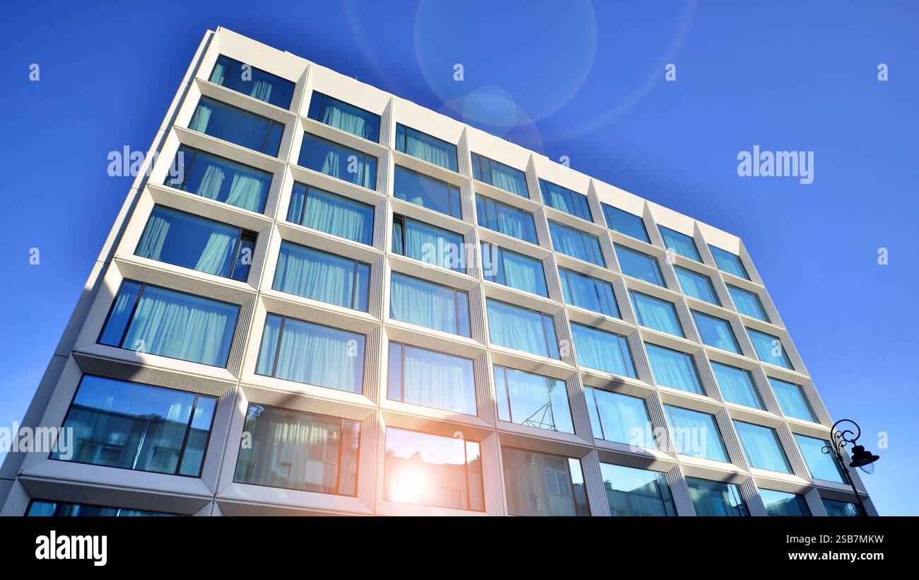Large glass windows in a modern hotel building. Modern urban ...