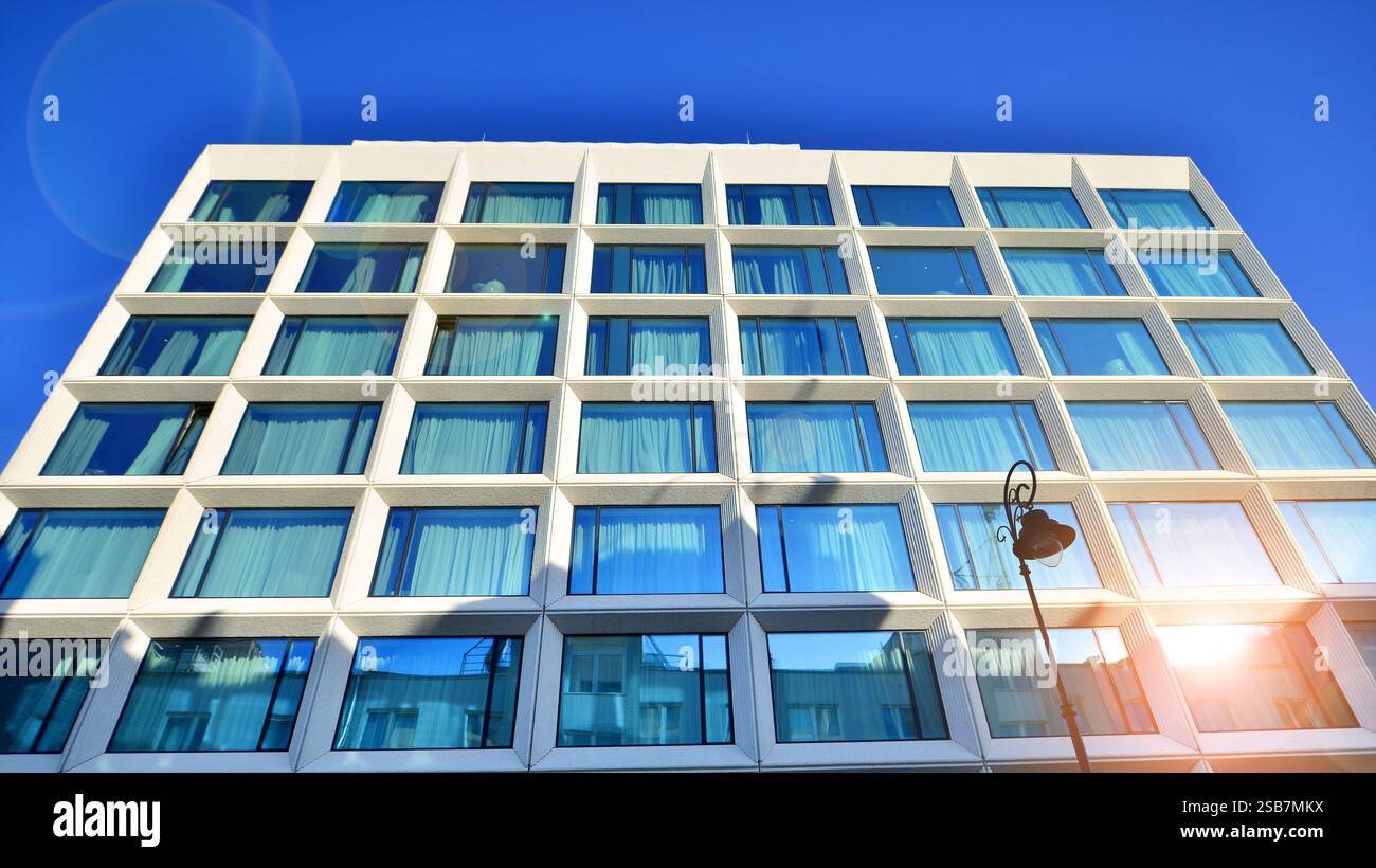 Large glass windows in a modern hotel building. Modern urban ...