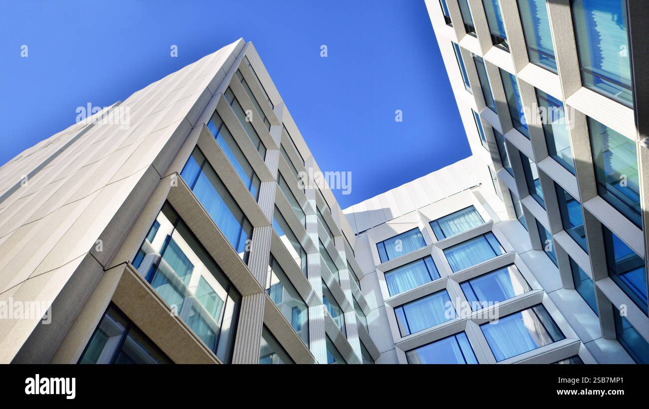 Large glass windows in a modern hotel building. Modern urban ...