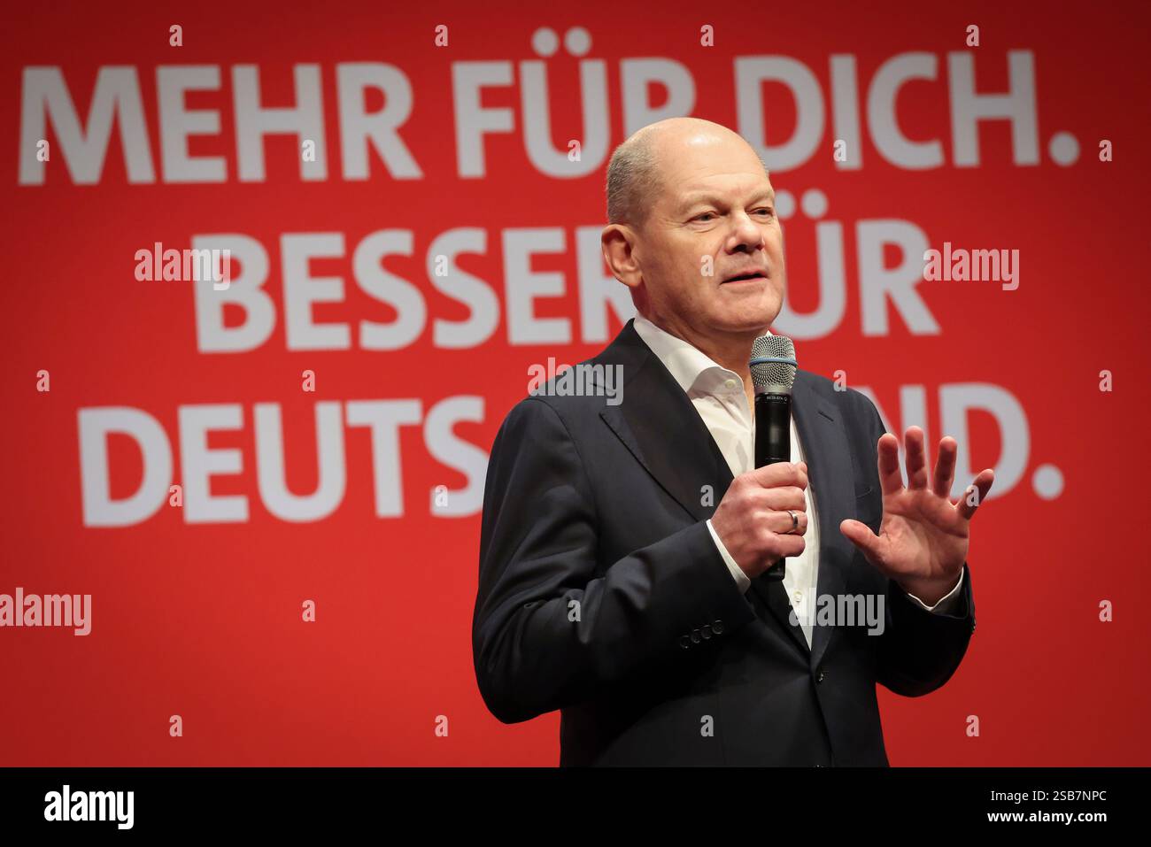 Chancellor Olaf Scholz speaks at an SPD election campaign event at ...