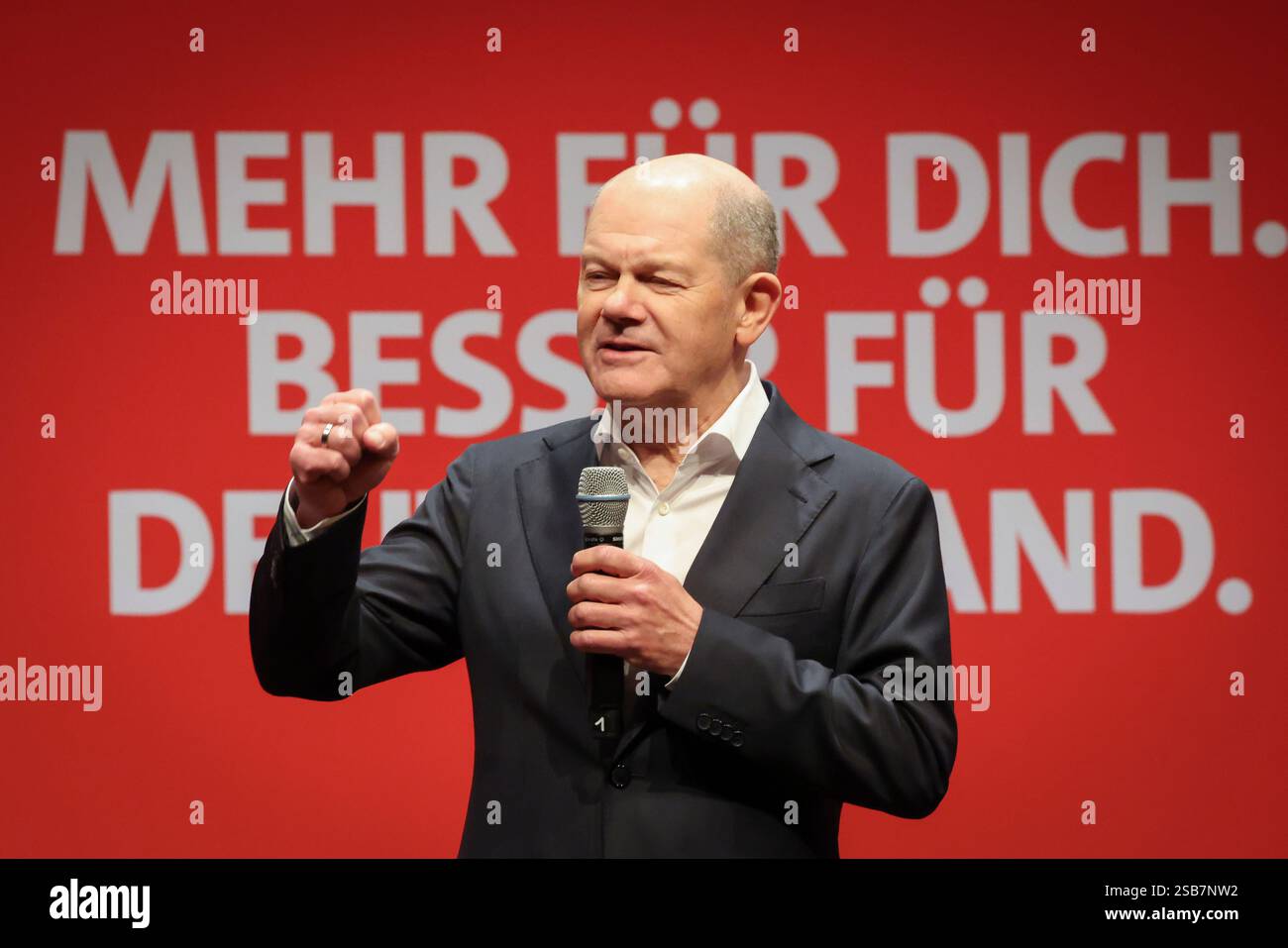 Chancellor Olaf Scholz speaks at an SPD election campaign event at ...