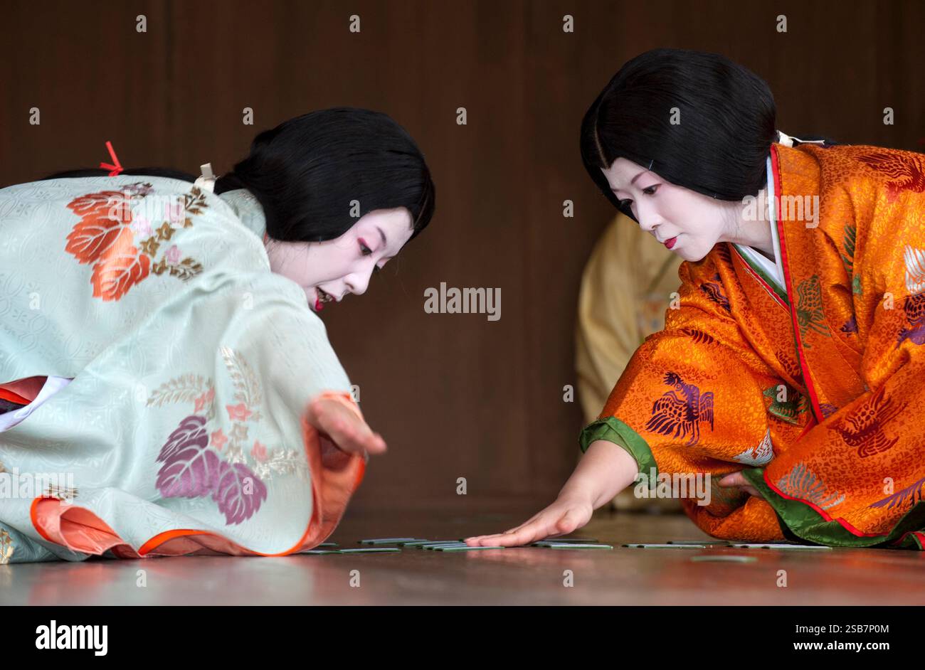 Women dressed in Heian Period costumes playing a New Year traditional ...
