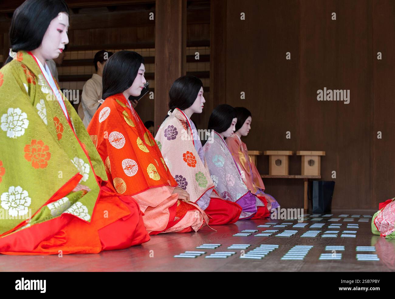 Women dressed in Heian Period costumes playing a New Year traditional ...