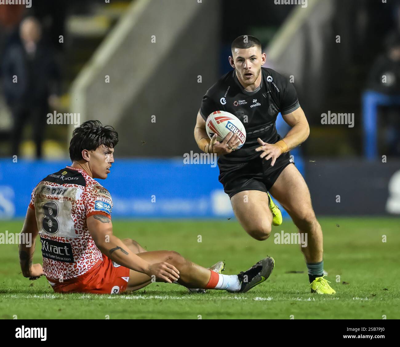 Danny Walker of Warrington Wolves makes a break during the Toby King's ...