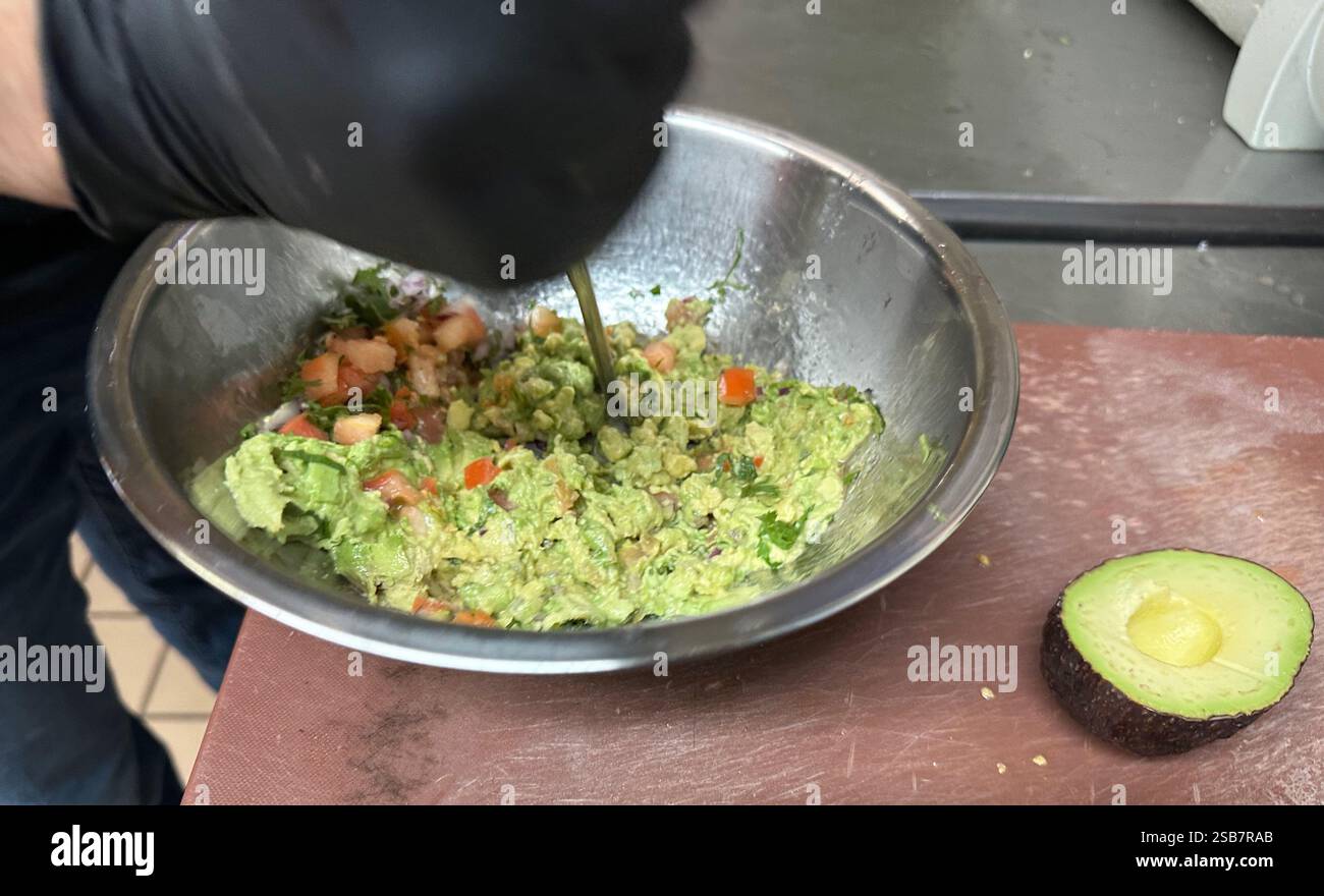February 1, 2025, Racine, Wisconsin, USA: JOSE SAUCEDO prepares a ...