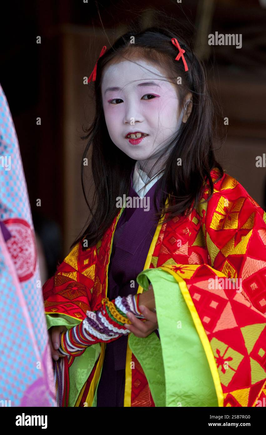 Females dressed in colorful kimono as aristocrats from the Heian Period ...