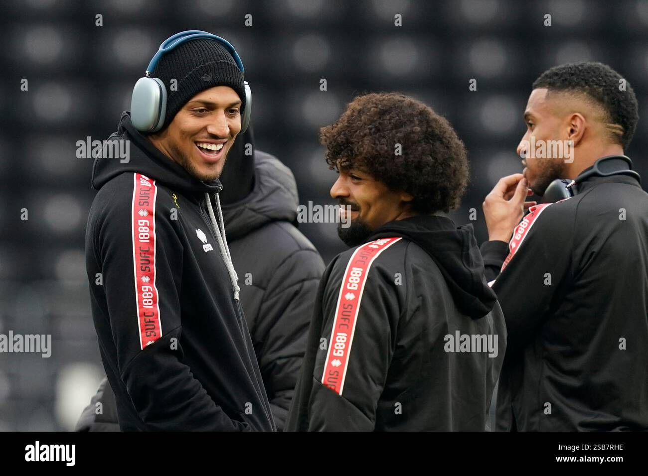 Derby, UK. 1st Feb, 2025. Vinícius Souza of Sheffield United jokes with ...