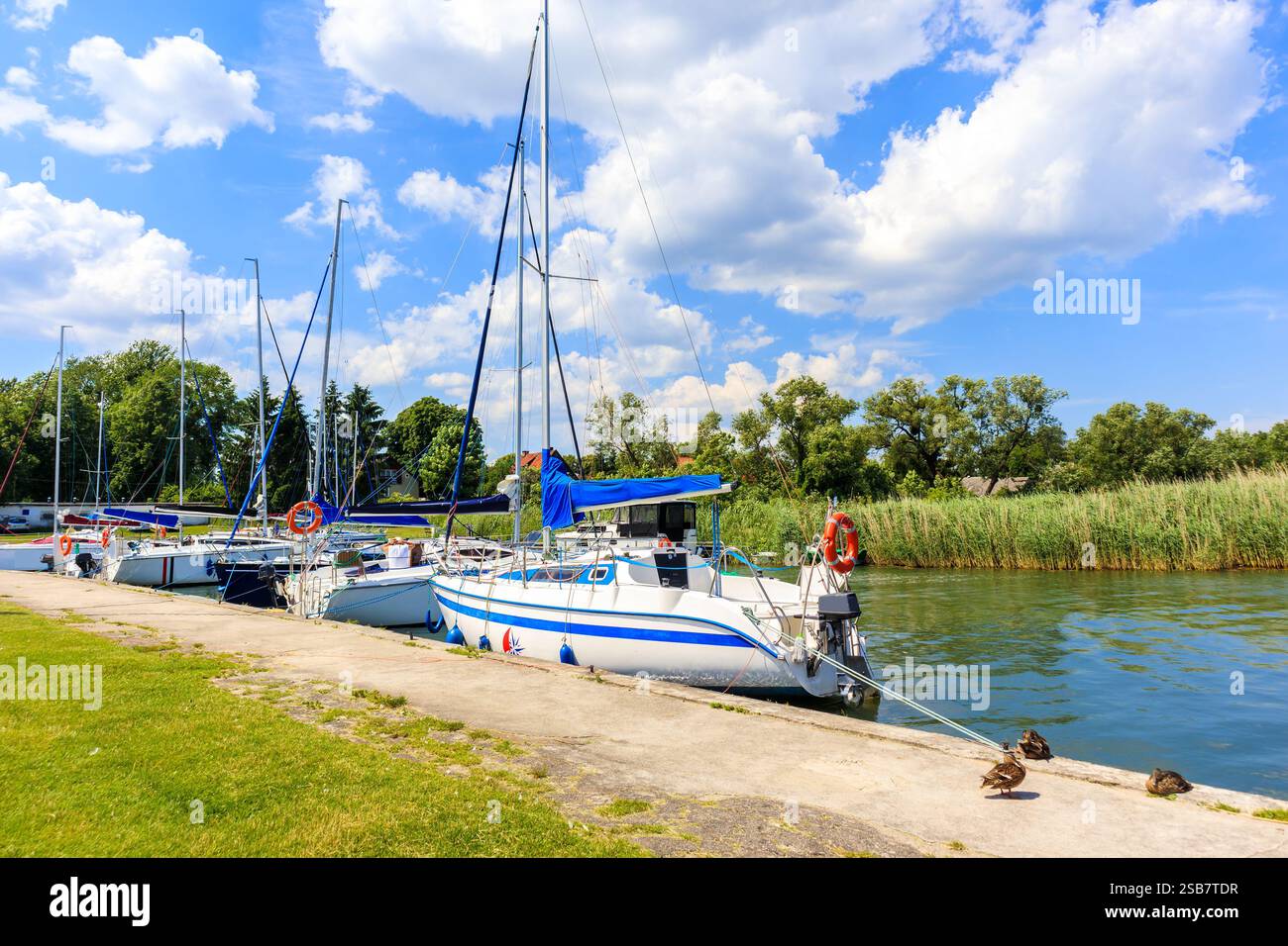 Boats anchoring in Popielno sailing port on Lake Sniardwy on summer ...